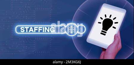 Handwriting text Staffing. Word Written on The percentage of workers ...