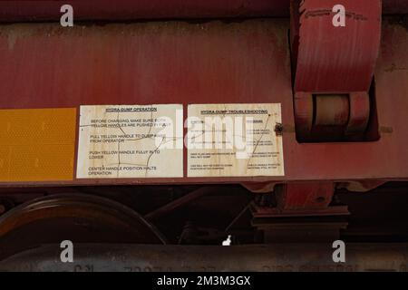 A railroad dump car on the tracks at the BNSF train yard, in the town ...