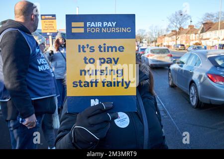 Nurses holding up placards on the picket line during strike day outside ...