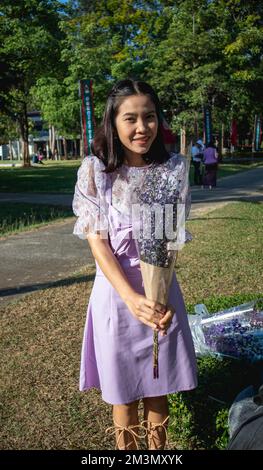 The graduate wore a gown from a university in Thailand. For graduation ...