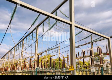 electrical substation with various voltage converters and transformers ...