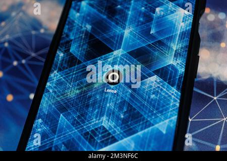 Lensa application on smartphone. Lensa app uses AI to make magic ...