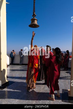 Indian people ringing bell in Savitri Temple, Rajasthan, Pushkar, India ...