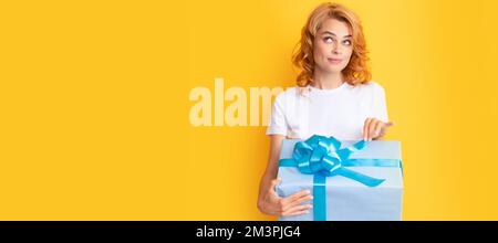 cheerful dreamy redhead lady opening giftbox. womens day Stock Photo ...