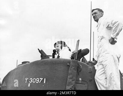 Winston Churchill in the turret of the heavy battle tank which bore his ...