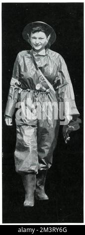 A female air raid warden in her tin helmet during the Second World War ...