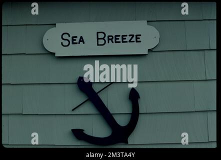 'Sea Breeze' sign and representation of anchor on wall , Signs Notices ...