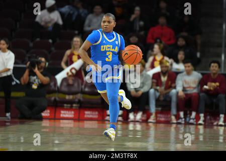 UCLA guard Londynn Jones dribbles the ball during the first half of an ...