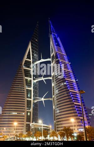 The sail-shaped towers and wind turbines of Bahrain WTC towers signify ...