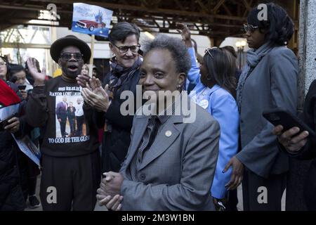 Mayor Lori Lightfoot and her wife, Amy Eshleman, walk in the 50th ...
