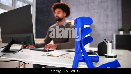 Worker With Crutches At Workplace. Social Security Compensation Stock ...