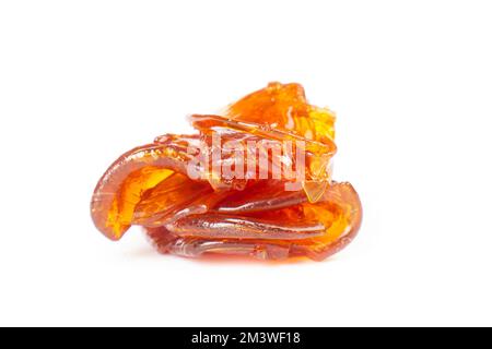 a pieces of cannabis wax closeup isolate on white background ...