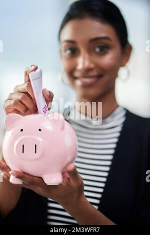 Success is all in a days work. a young businesswoman in an office Stock ...