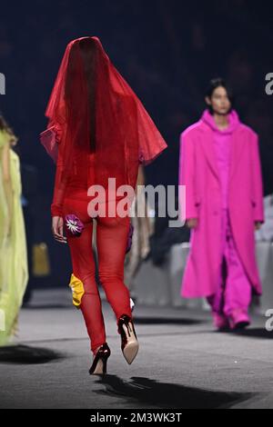 A model walks the runway during the Qatar Fashion United by CR at 974 ...