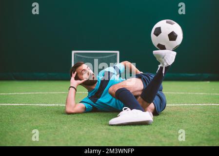 Cinematic image of a soccer freestyle player making tricks with the ...