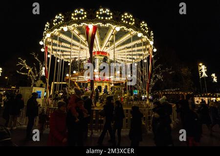 Traditional merry-go-round at Wiener Christkindlmarkt, Rathaus Platz ...