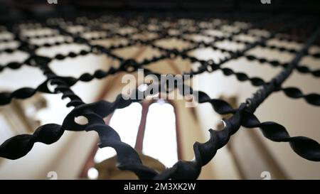 Metal patterns closeup inside Church Cathedral. Iron grid divide Stock ...
