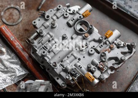 Car automatic transmission parts and repair tool on table Stock Photo ...
