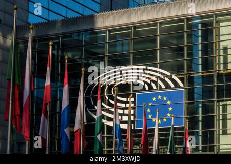 The european parliament facade and its stylised hemicycle logo with the ...
