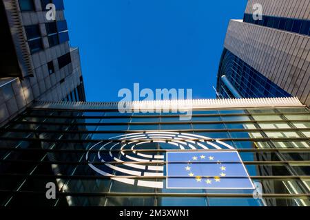 The european parliament facade and its stylised hemicycle logo with the ...