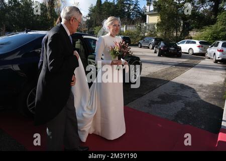 The bride Cristina Reyes with her father seen during her wedding ...