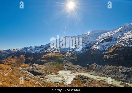 Snowy Mountains with Pasterze on a sunny day at Hochalpenstrasse ...