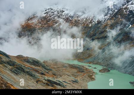 Clouds lying in the valley at Pasterze Hochalpengletscher ...