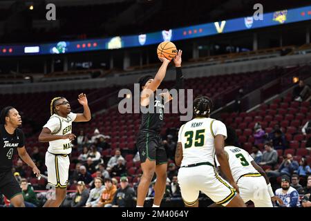 Tulane guard Jalen Cook (3) shoots between Houston forward Reggie ...