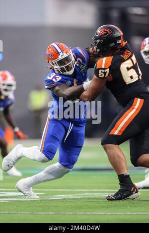 Oregon State offensive lineman Joshua Gray (67) warms up with teammate ...