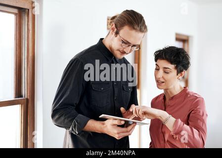 We need to work on this. businesspeople working together in the office ...