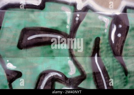 Graffiti word OMEN! Drawn by a lapdog in voluminous green letters with ...