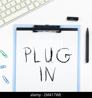 Conceptual caption Plug In. Business showcase putting device into ...