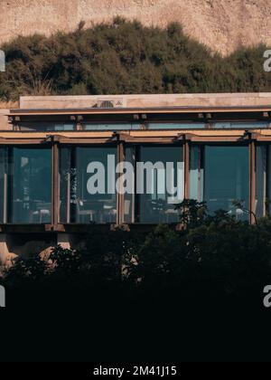 A cafe building with glass facade in downtown Stock Photo - Alamy