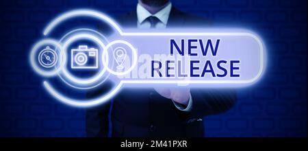 Sign displaying New Release. Business concept announcing something ...