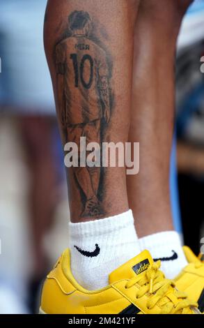 Argentina's Lionel Messi features as a tattoo on a fans calf ahead of ...