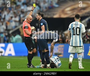 Argentina's Lionel Messi is shown a yellow card by referee Antonio ...