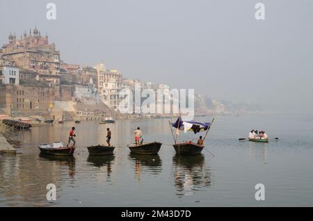 A boatride on the holy river Ganges is part of every pilgrimage Stock ...