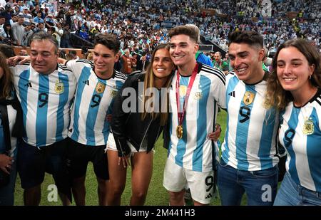 Argentina's Julian Alvarez (centre) celebrates with his father ...