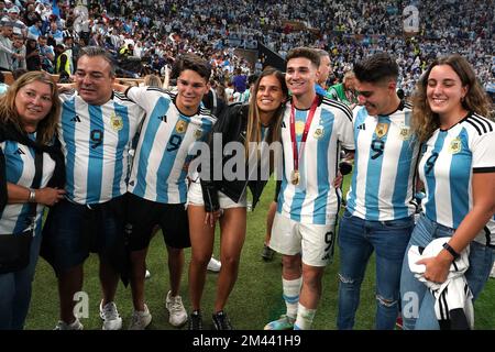 Argentina's Julian Alvarez (centre) celebrates with his father ...