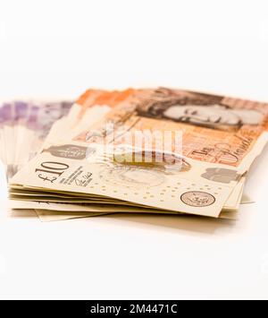 a detailed close-up of new fanned plastic GBP £ Sterling 20 Twenty ...