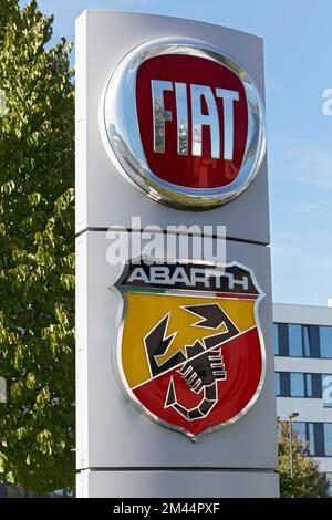 Italian car brand Abarth, company logo with scorpion, logo on a column ...