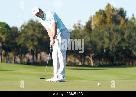 Orlando, Florida, USA. 18th Dec, 2022. Connor Cink (R) and his father ...