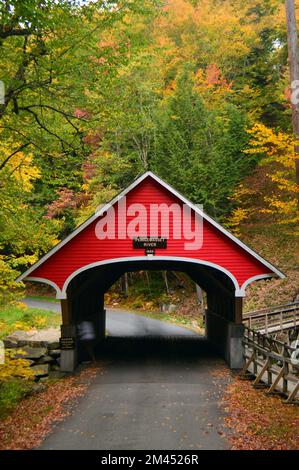 Red covered bridge over the Pemigewasset River, The Flume, Franconia ...