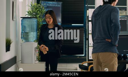 Database web developers developing source code and cloud computing in it big data office room ...