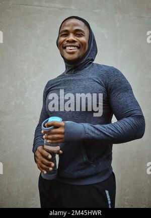 Black man, city runner and start running training on road, outdoor ...