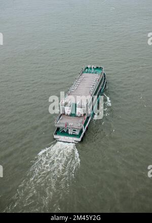 Aerial shot of yacht sailing over Cape Cod Canal near Bourne bridge ...