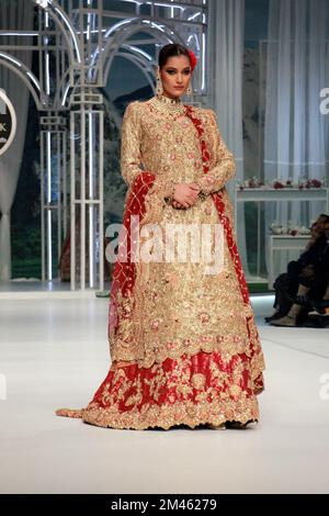 Lahore. 18th Dec, 2022. A model presents a creation during the Bridal ...