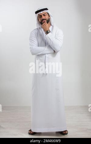 Arab man thinking Stock Photo - Alamy