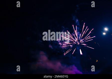 Bright, pink fireworks against the background of the night sky Stock ...