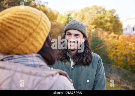 Happy couple in autumn scenery Stock Photo - Alamy
